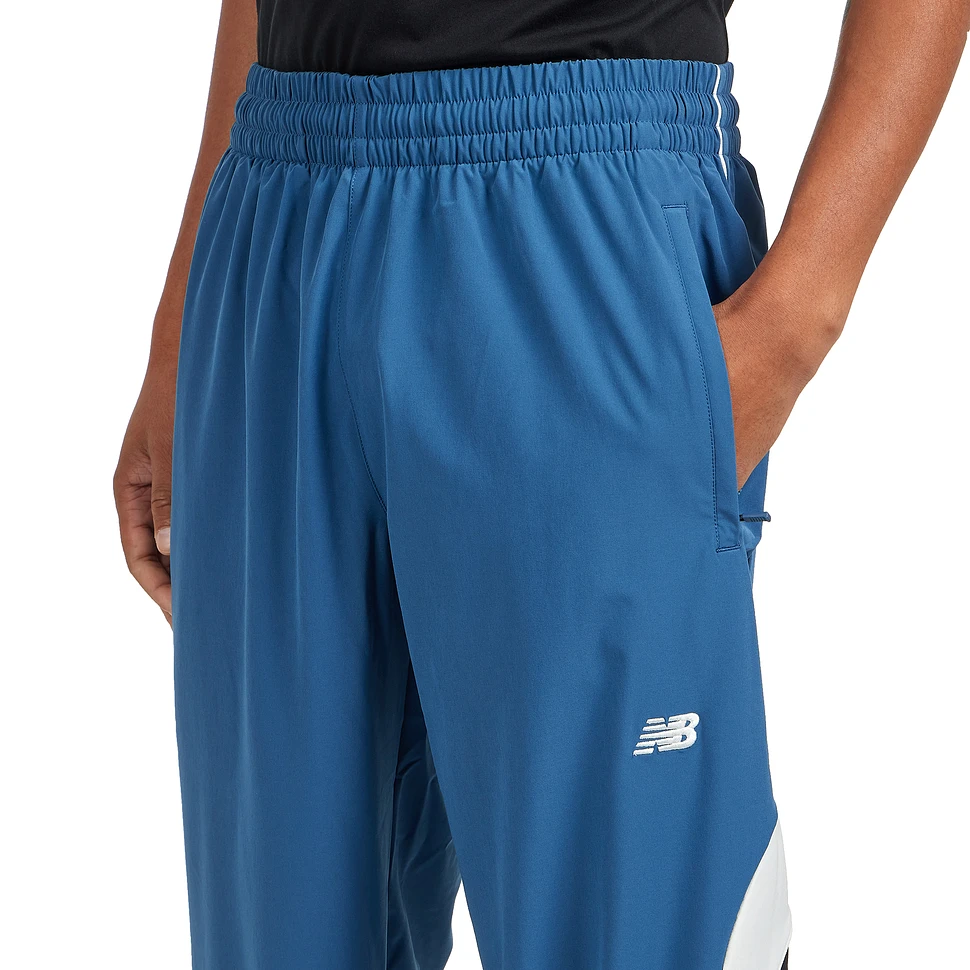 New Balance - In Game Woven Track Pant (Dark Shoreline Blue) | HHV